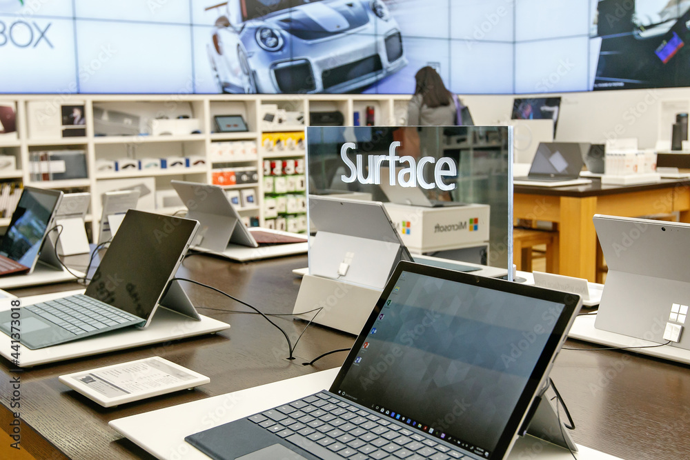 Variety of laptops running Windows Surface for sale at a Microsoft ...