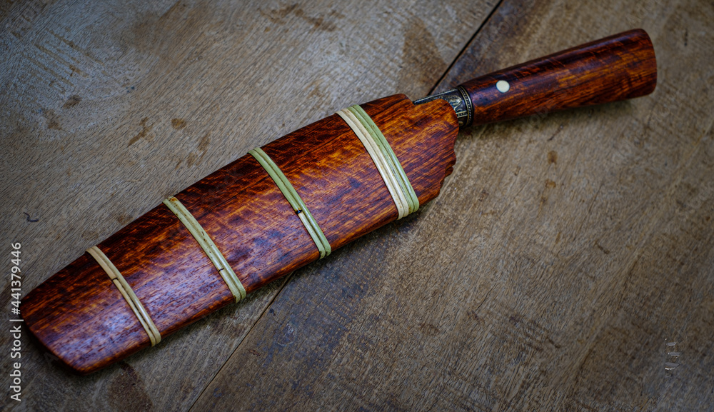 knife custom or Enep in the natural wood scabbard on old table ...