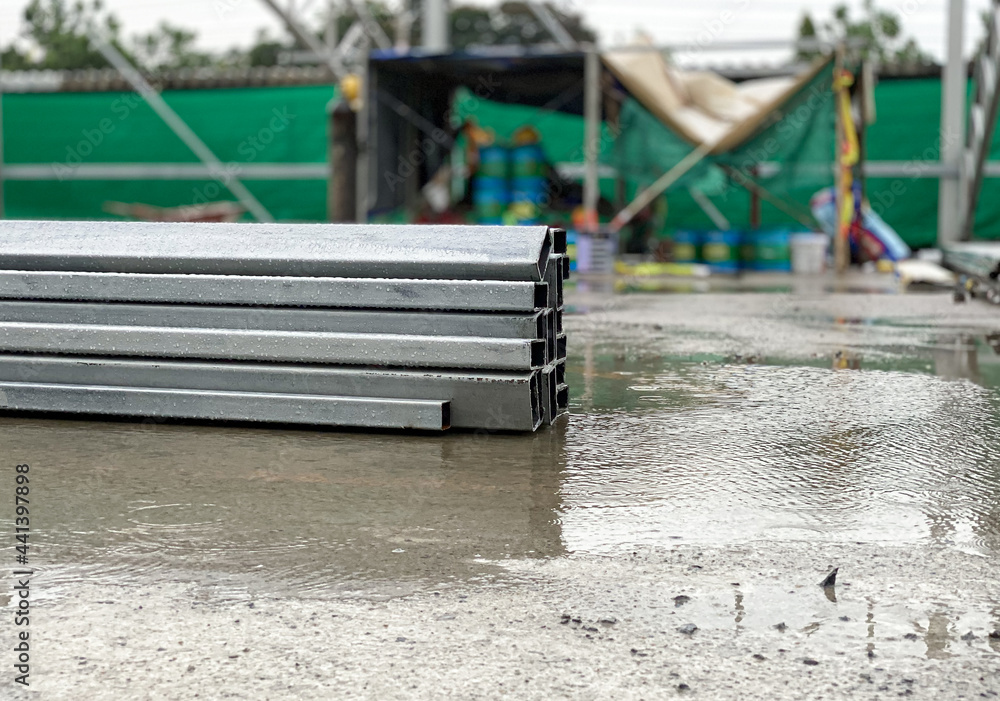 Foto de Copy space. Iron rods piled on the ground for building ...