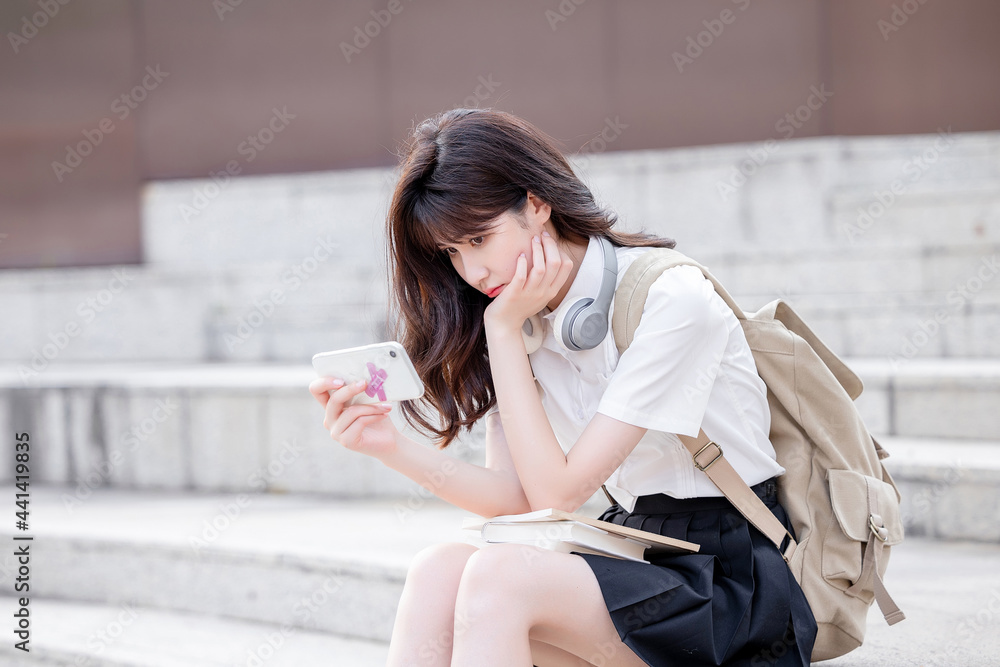 Outdoors, pretty beautiful Asian female college student Stock Photo ...