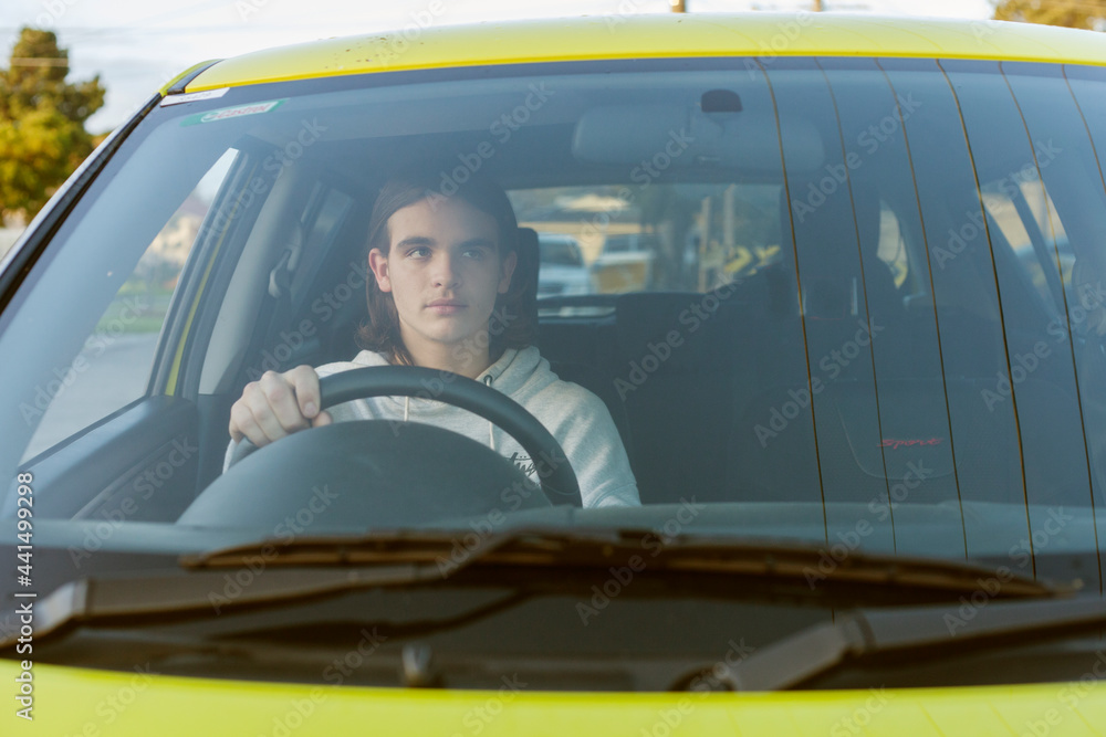 Teenage boy learning to drive Stock Photo | Adobe Stock