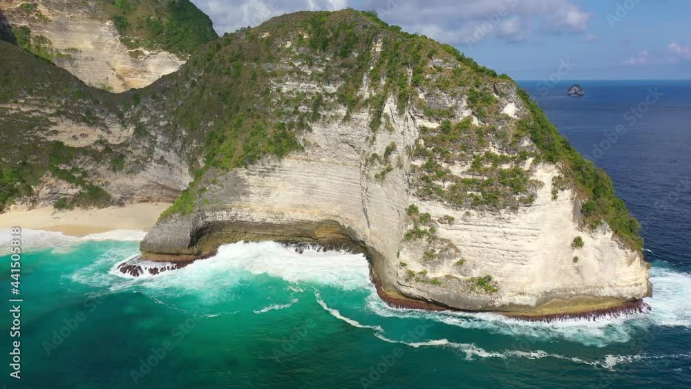 Dramatic aerial drone footage of the famous Kelingking beach, aka T Rex ...