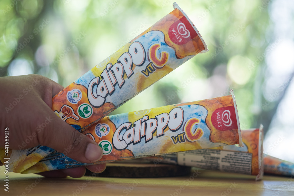 Samut Prakan, Thailand - June 25, 2021 : Hand holding with Calippo ice ...