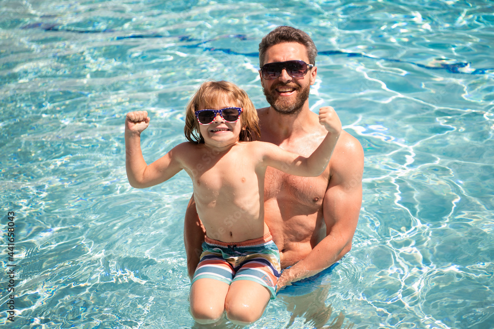 Father and son swimming in pool, summer family vacation. Pool party ...