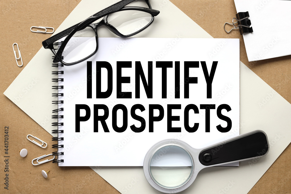 Identify Prospects. text on white notepad on craft background Stock ...