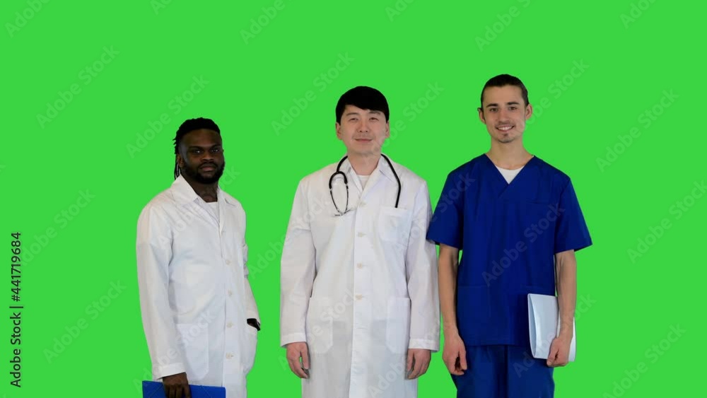 Multiracial group of young doctors come together on a Green Screen ...