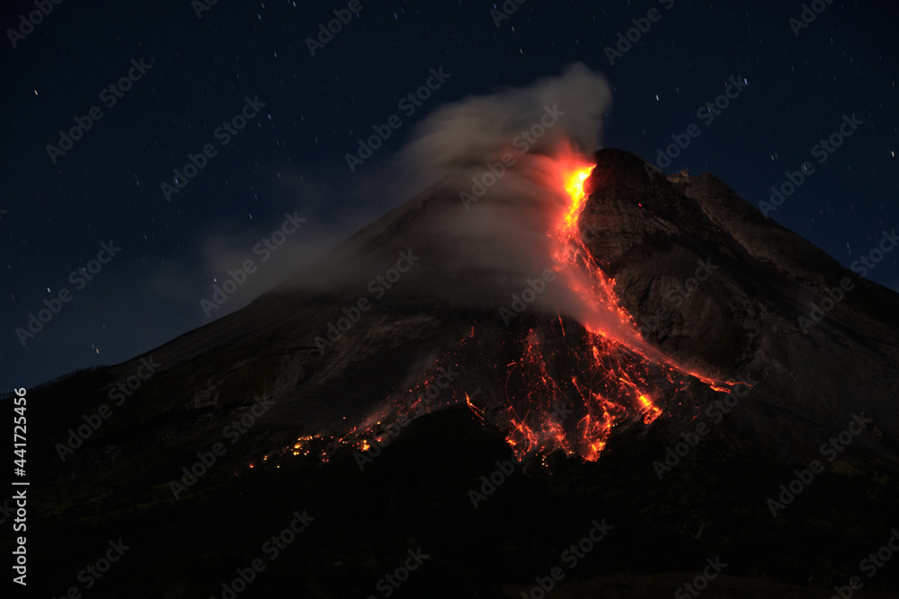 Mount Merapi erupts with high intensity at night during a full moon ...