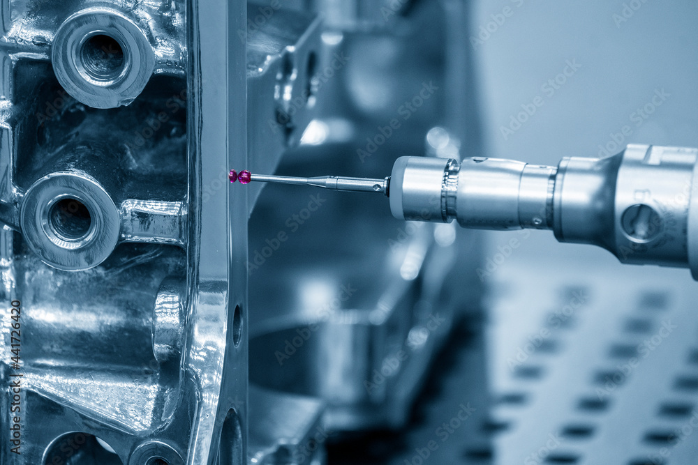 The multi-axis CMM machine checking the cylinder block parts . The ...