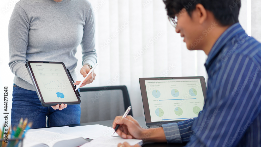 Office work concept a businesswoman showing a statistic graph ...