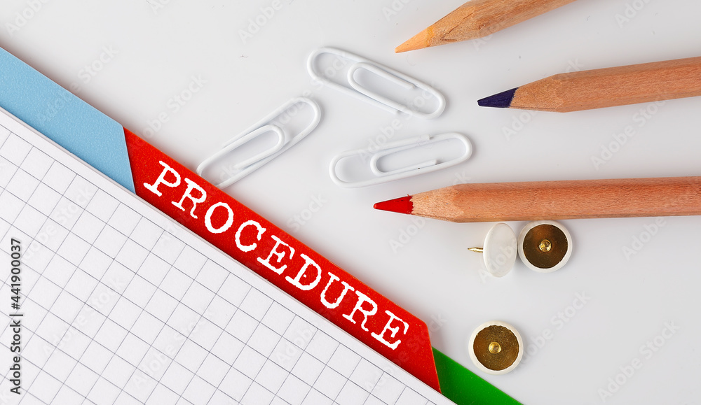 PROCEDURE text on the folder register with office tools Stock Photo ...
