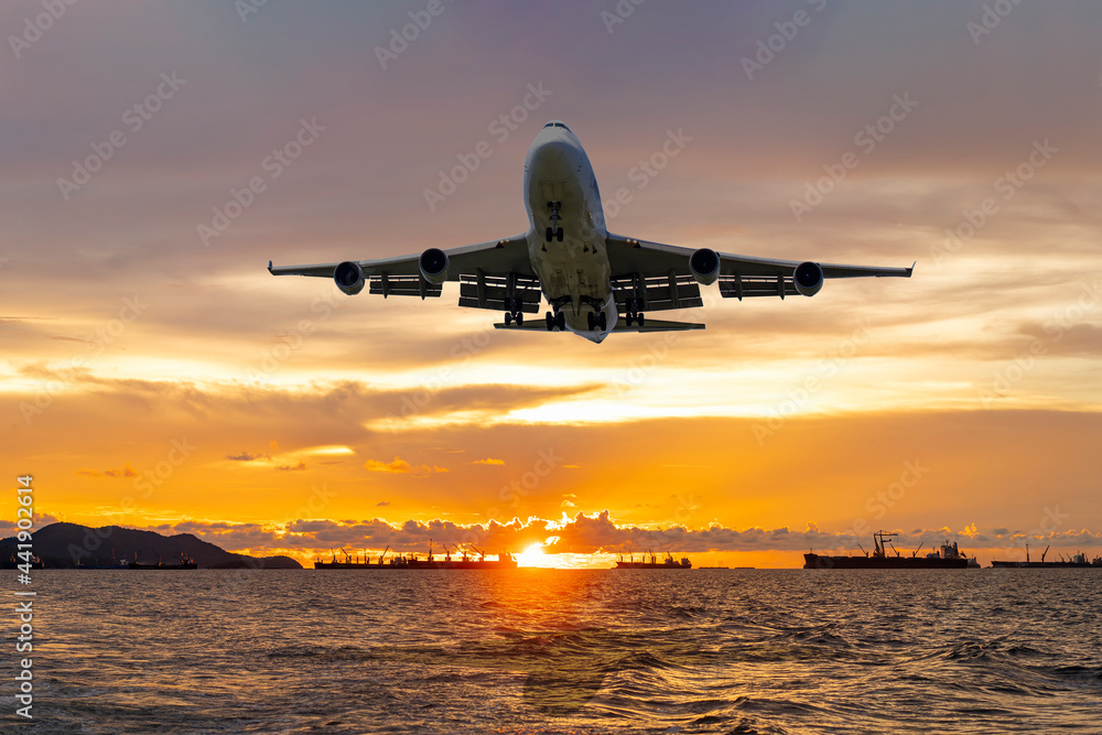 front image commercial passenger aircraft or cargo airplane fly over ...