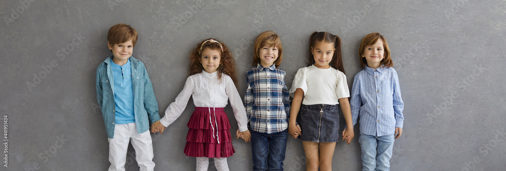 Banner with portrait of happy little kids in casual wear. Group of ...