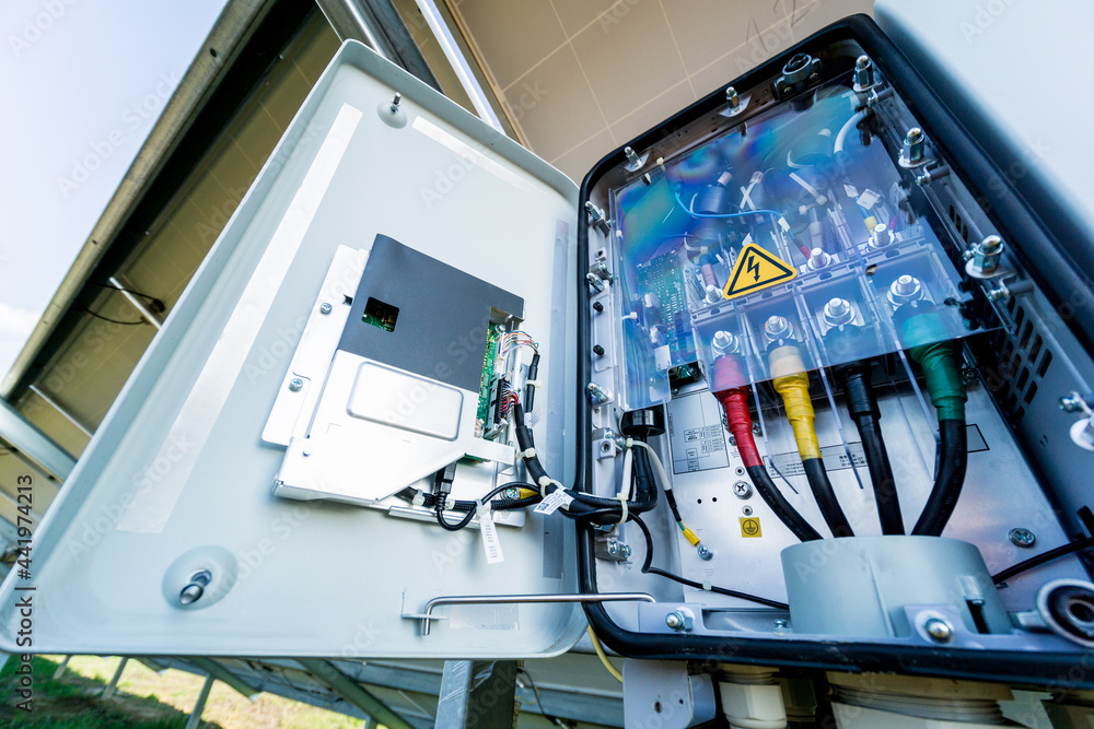 Opened voltage inverter at the back side of solar panel Stock Photo ...