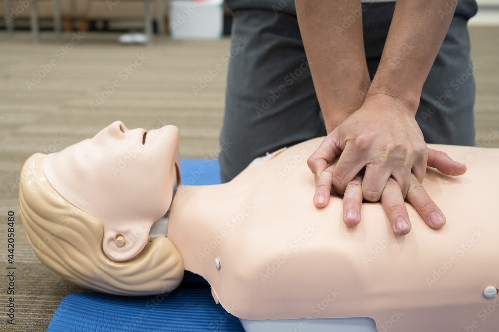 Demonstrating CPR (Cardiopulmonary resuscitation) training medical ...