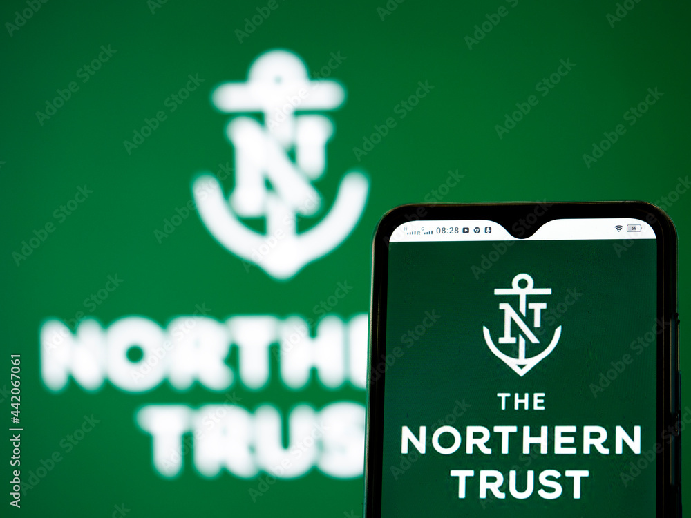 In this photo illustration a Northern Trust Corporation logo seen ...