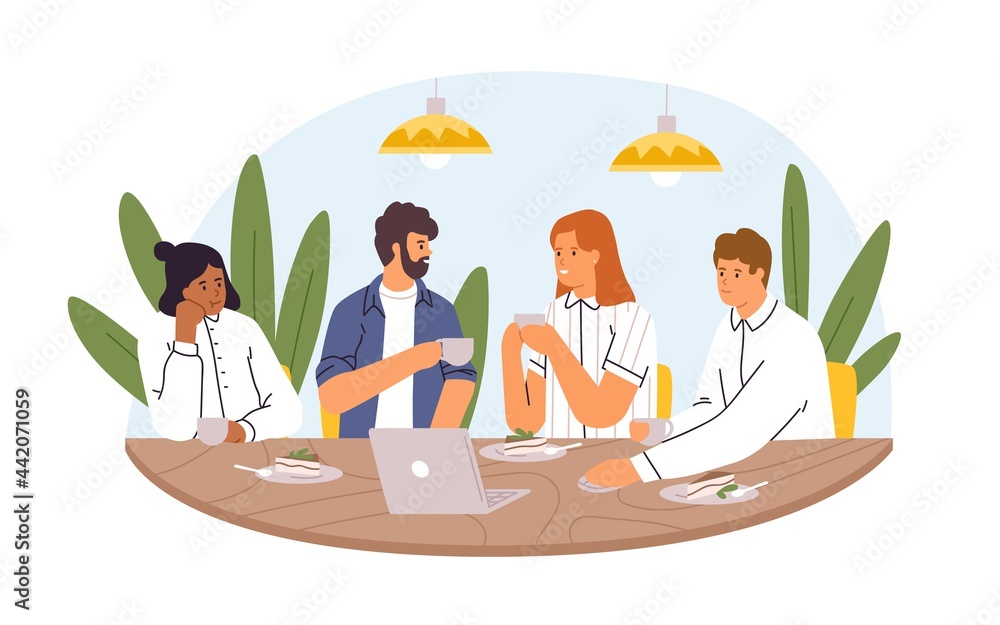 Colleagues sitting at dining table at coffee break, chatting and ...