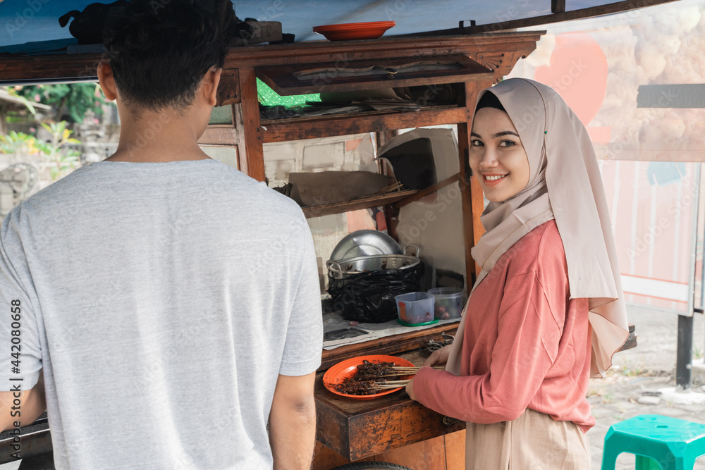 happy young business food cart owner. small culinary food stall. man ...
