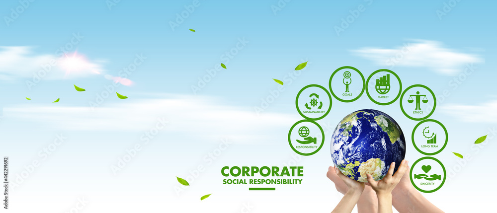 Corporate social responsibility (CSR) concept. Hands holding earth globe over sky background ...