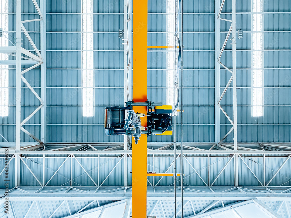 Overhead crane inside factory building, industrial background. Stock ...