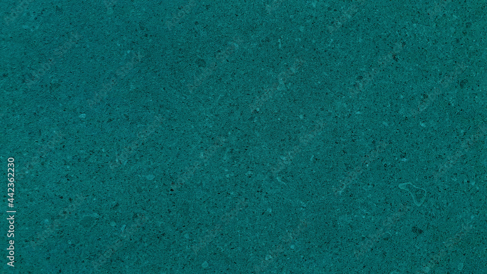 green or blue painted concrete texture with shadow and grain elements ...