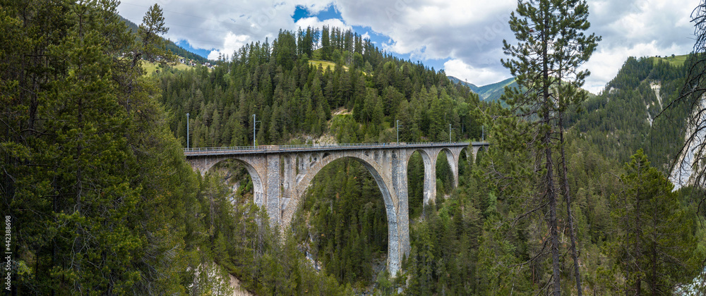 The famous Wiesener viaduct in the Landwasser Valley. It is the highest ...
