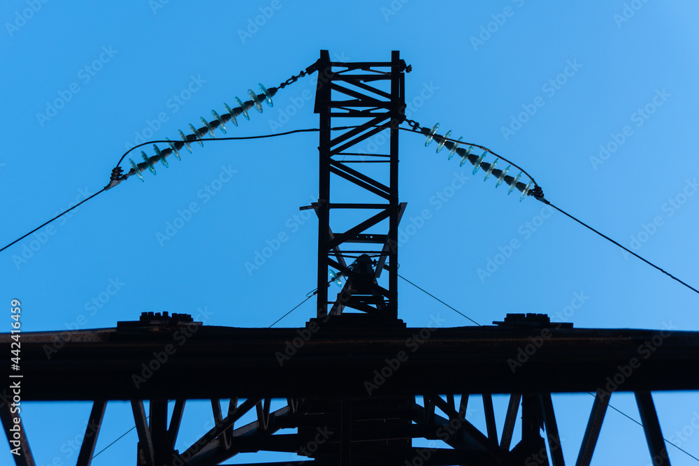 A close-up view of a rusted steel power transmission tower in Ukraine ...