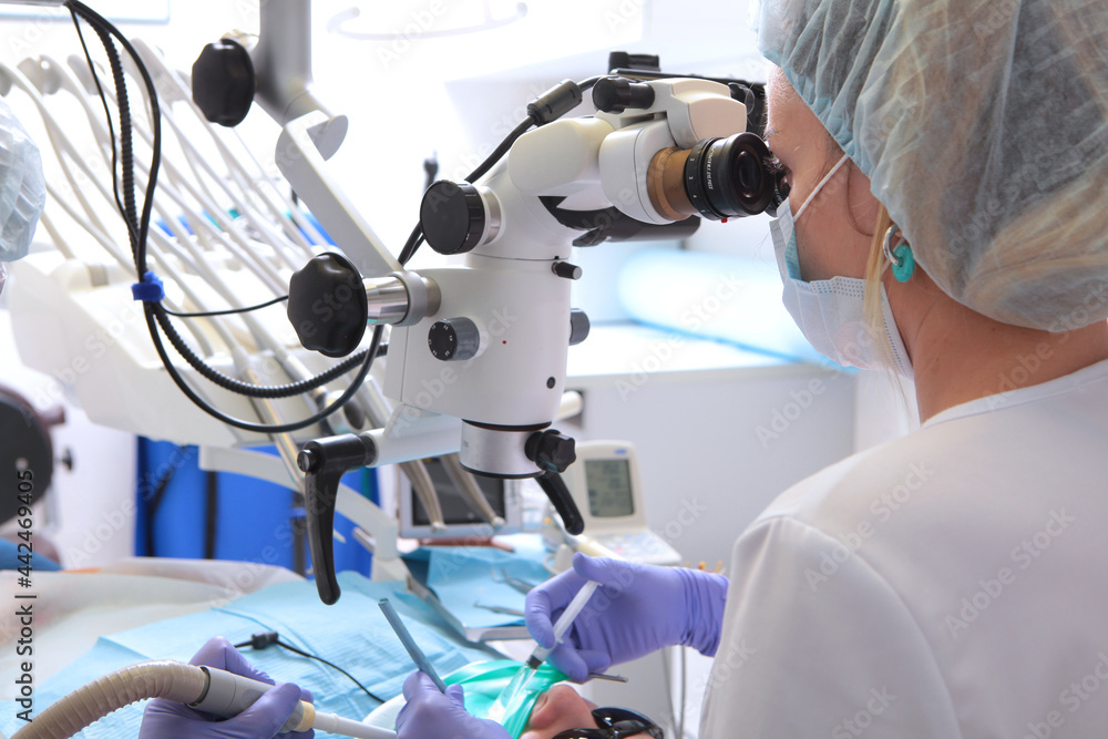 Dental microscope. Treatment of tooth root inflammation. Modern ...