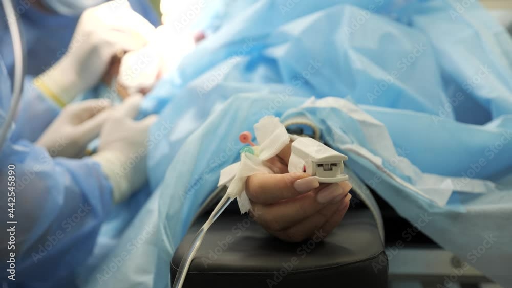 Healthcare medicine concept patient's hand with pulse oximeter on ...