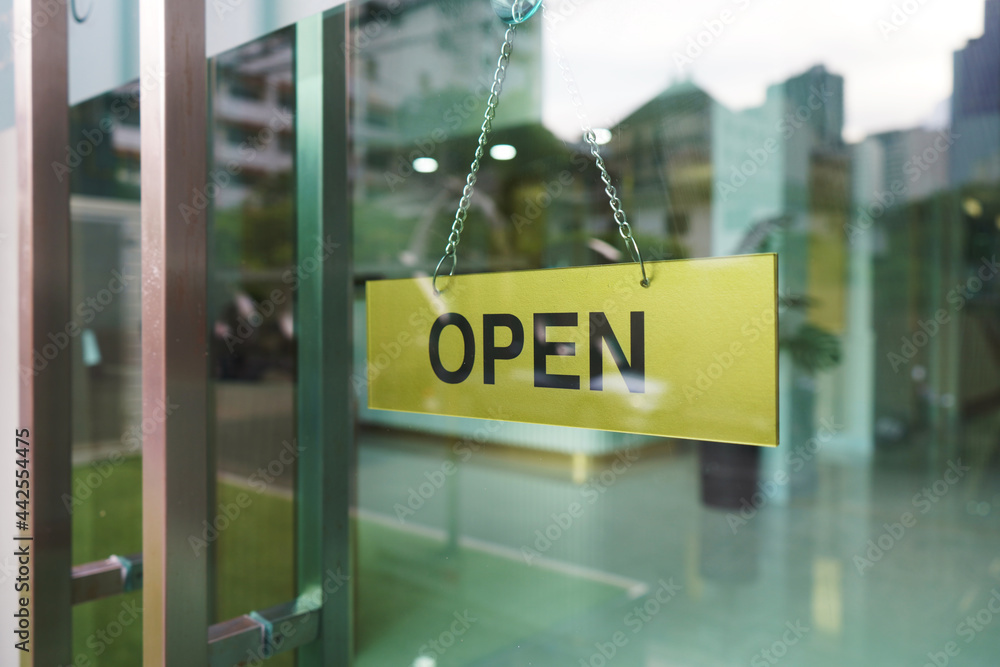 Hanging sign indicating the status is ready to open for service ...