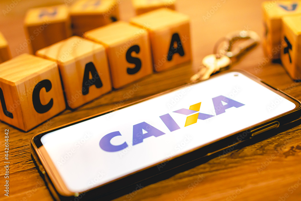 Banco CAIXA. Logo da Caixa Econômica Federal, o Banco Caixa, na tela de ...