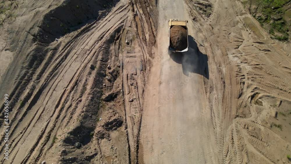 Mining truck transported sand from the open pit. Haul truck working in ...