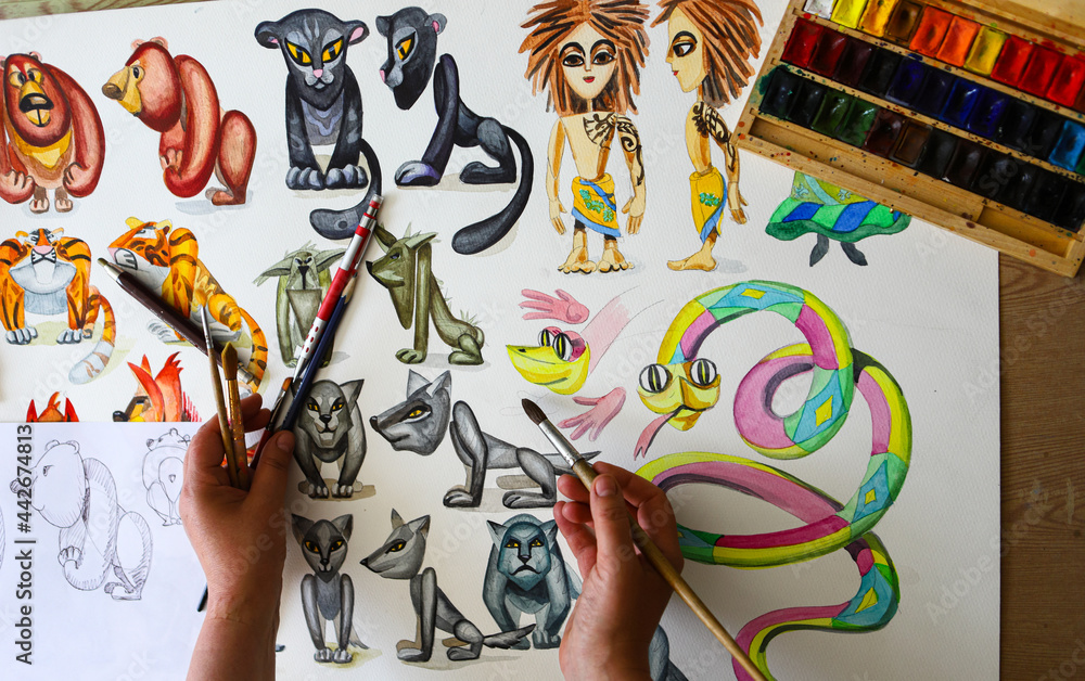 The animator draws with a pencil and draws characters from cartoons ...