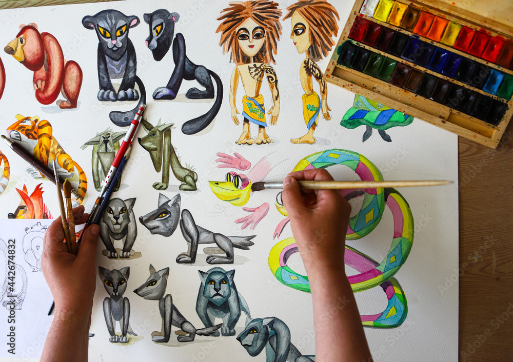 The animator draws with a pencil and draws characters from cartoons ...