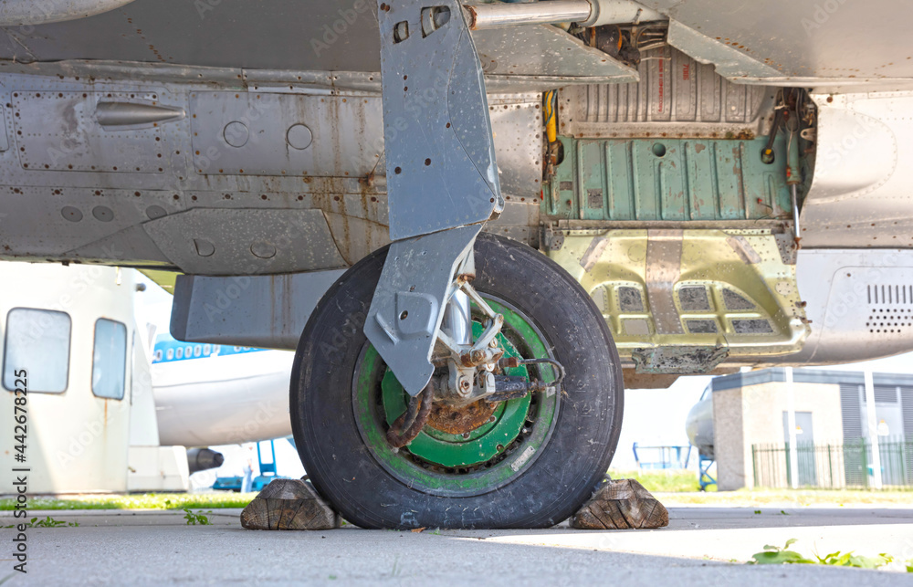 Old black flat wheel of an fighter jet Stock Photo | Adobe Stock