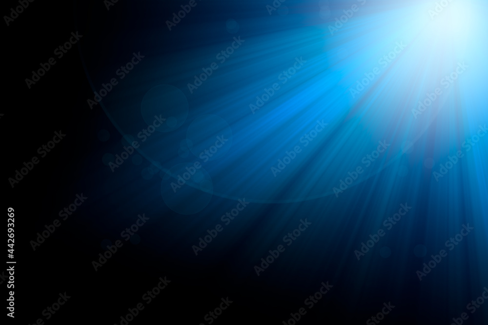 blue rays light and bokeh on black background for overlay design Stock ...