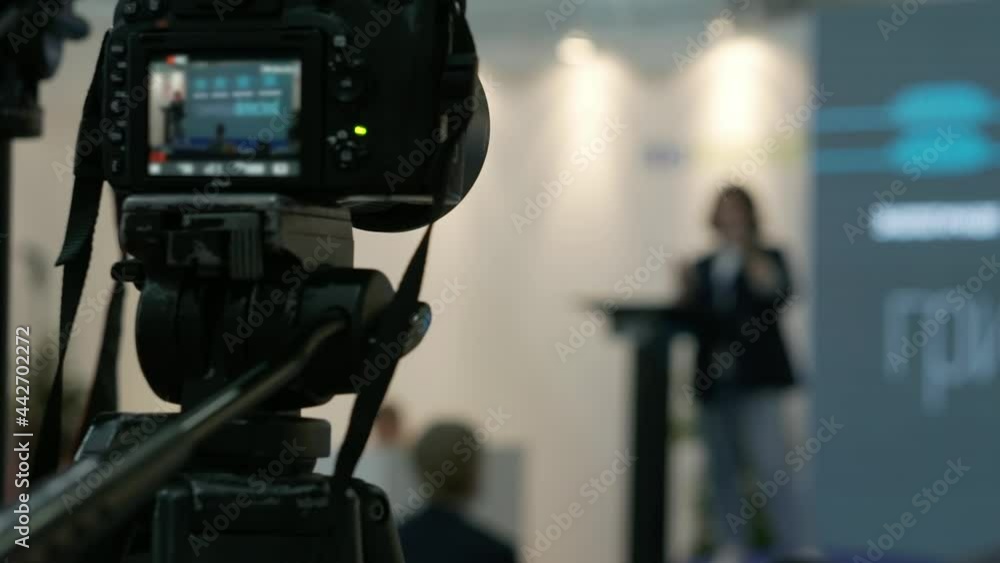 Filming of the speaker's speech at the presentation of a new product ...