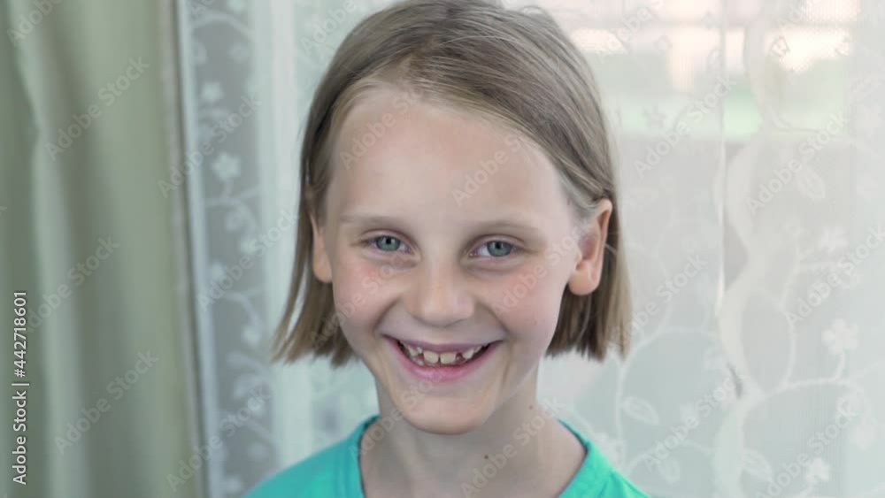 Portrait of a Smiling and Laughing Child. The Little Girl Smiles Laughs ...