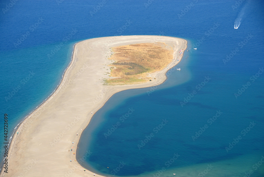 Tindari beach is famous for the particular shape of the strip of sand ...