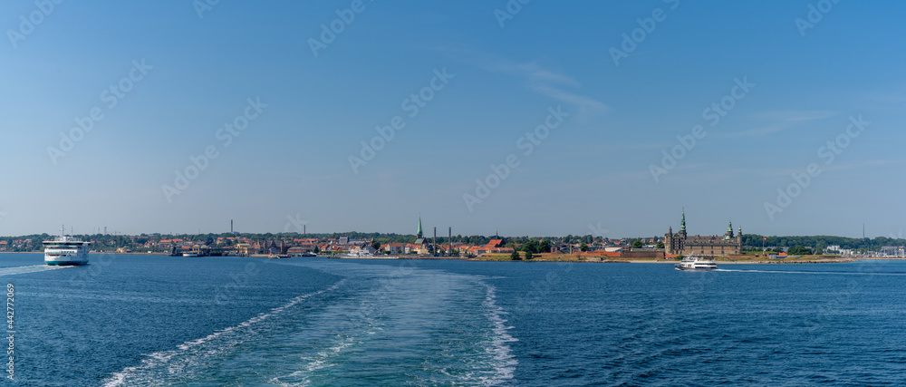 cityscape view of the Danish city of Helsingor and the ForSea Ferry ...