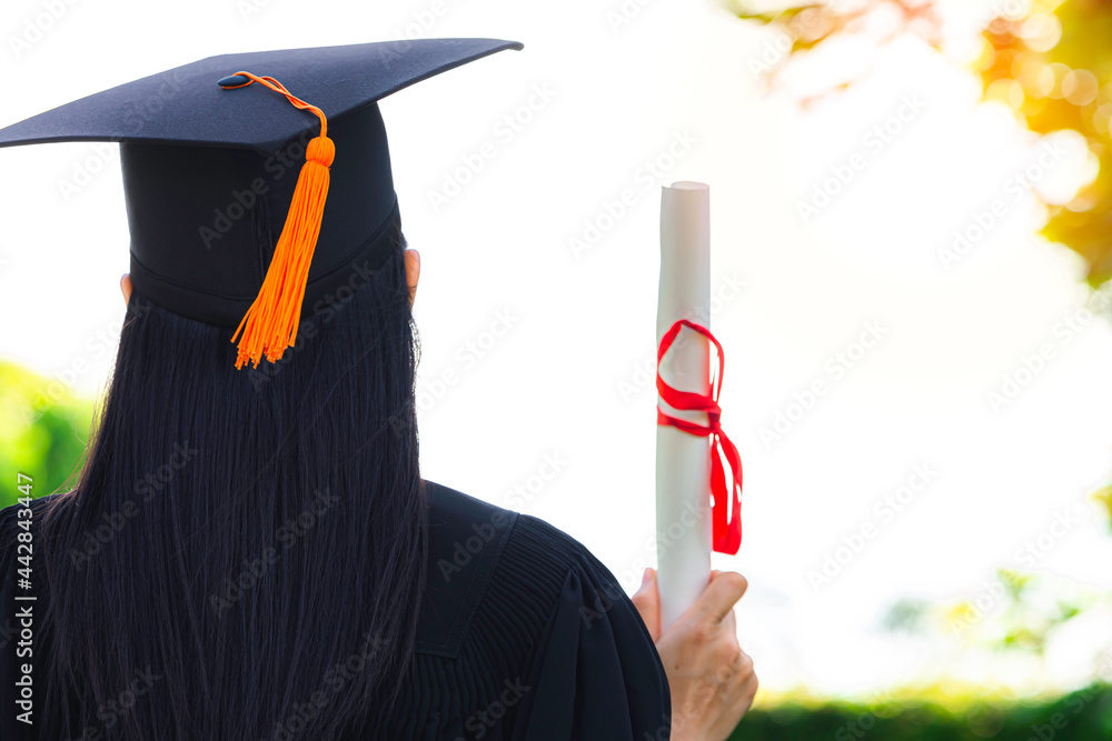New graduate student wear gowns, carry certificates and beautiful ...