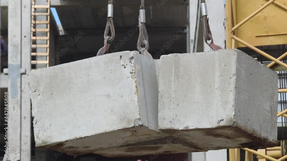 hoisting a concrete slab with crane using metal slings. Concrete slab ...