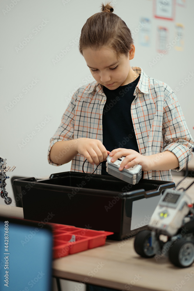 Boy Works on a Fully Functional Programable Robot for His School ...
