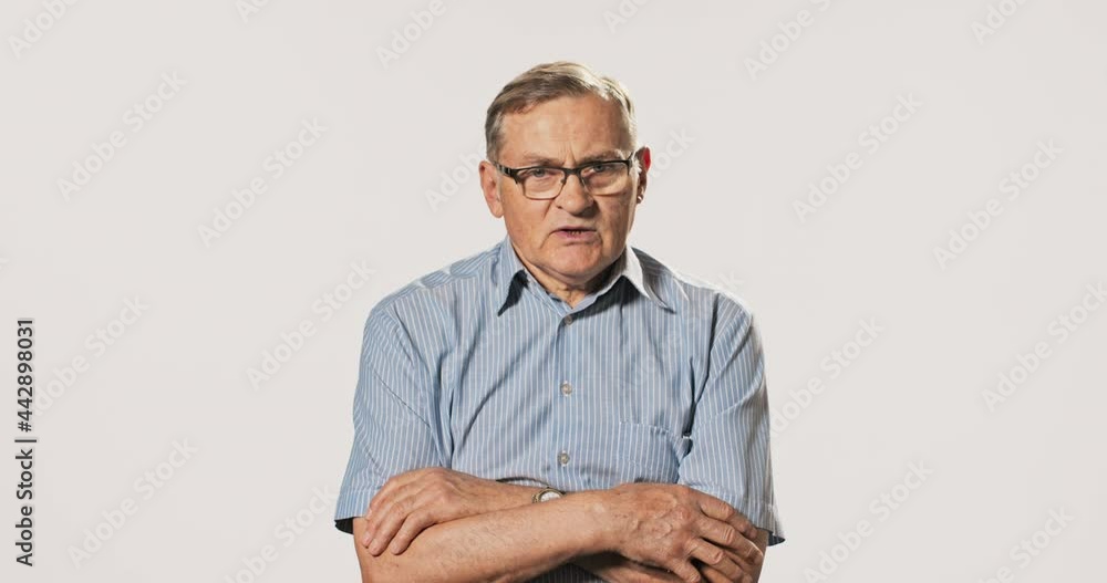 Conversation, interview with elderly man with glasses, school principal ...