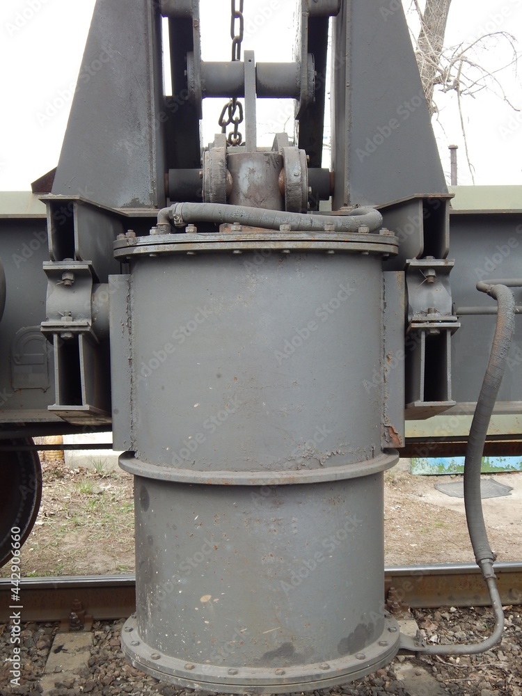 mechanism of unloading a freight train. Pneumatic cylinder of the ...