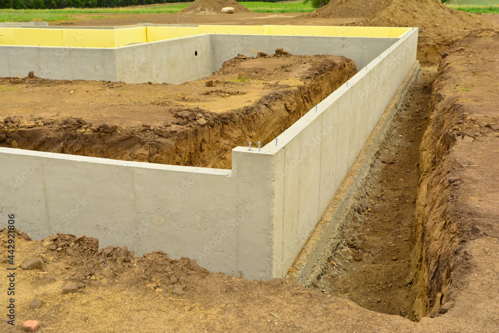 Concrete footings and basement walls complete and ready for the next ...