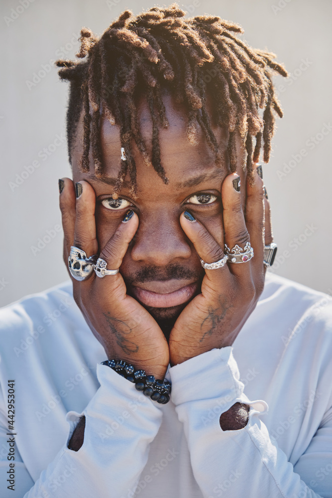 Stylish black man with unusual appearance Stock Photo | Adobe Stock