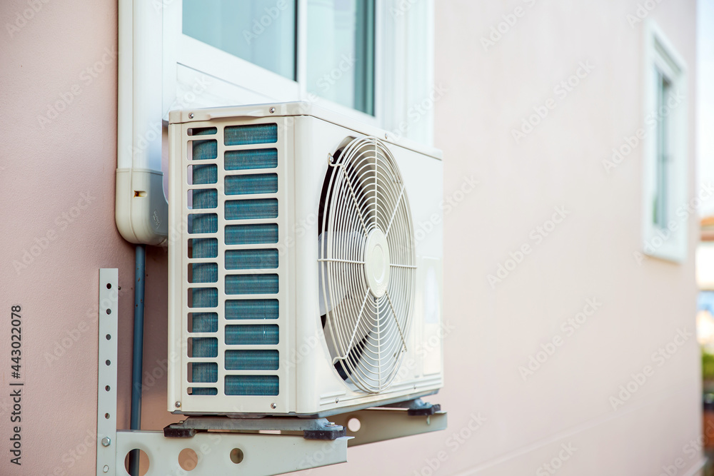 Air compressor, Close-up external split wall type of outdoor home air ...