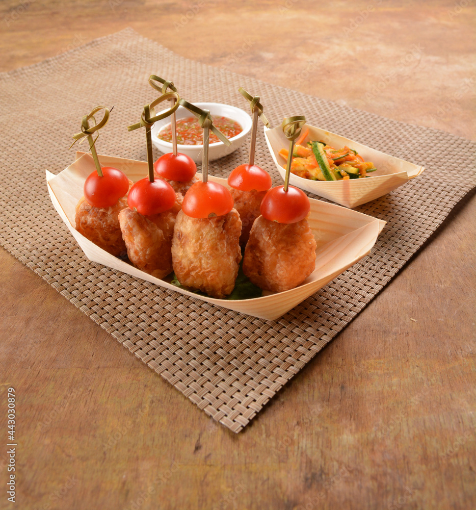 deep fried shrimp paste roll (wu Xiang) with achar and spicy sauce in ...