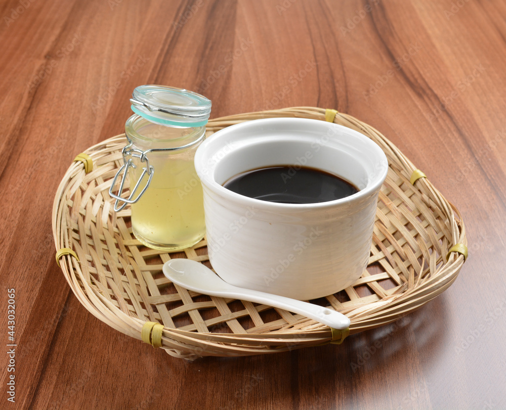 chilled black herbal jelly pudding (Gui ling gao) with fresh honey ...