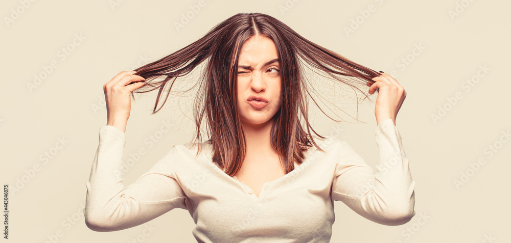 Woman having a bad hair, her hair is messy and tangled. Messy hair ...